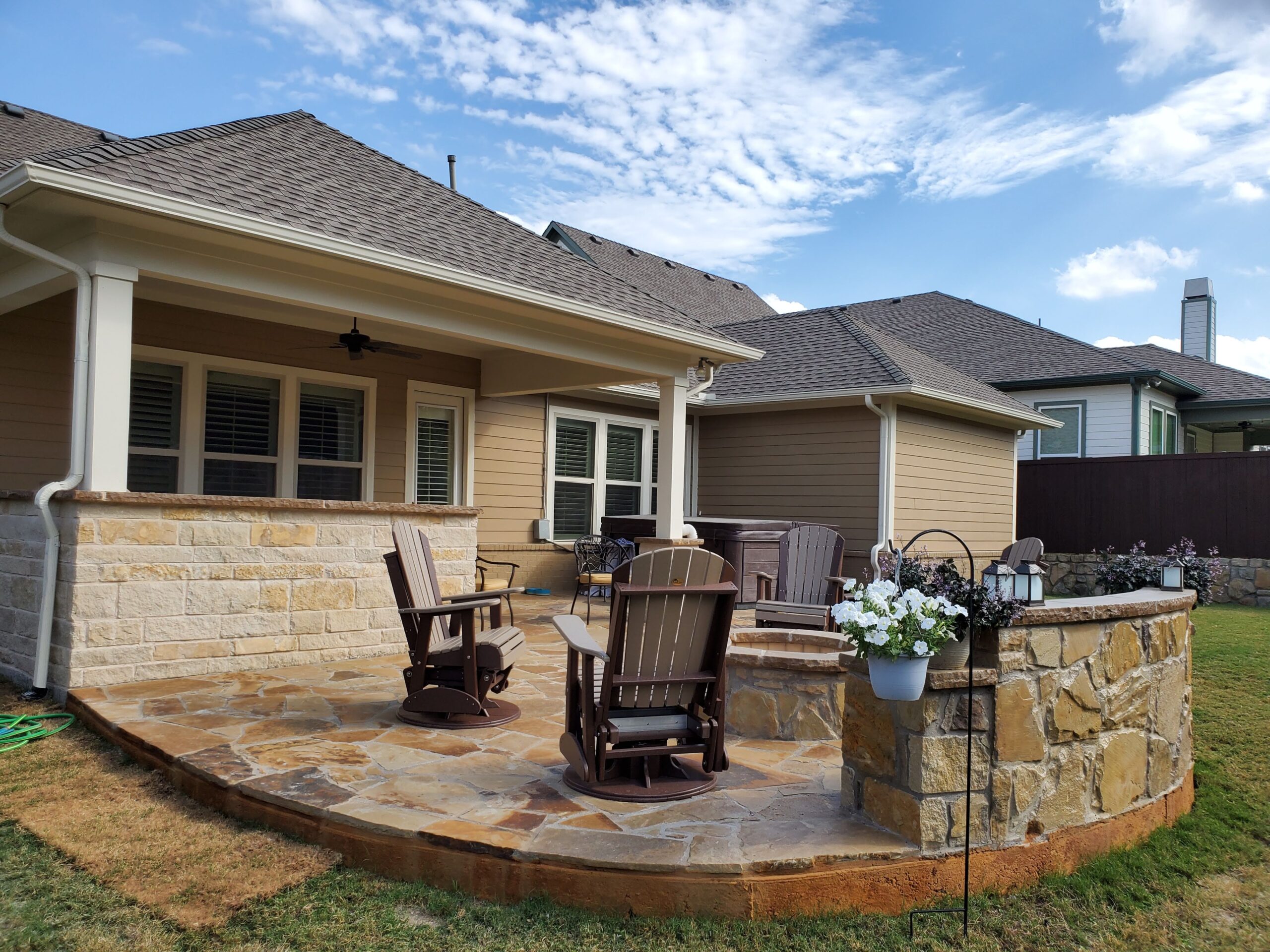 Pioneering Hill Country Flagstone Firepit with Stone Bench